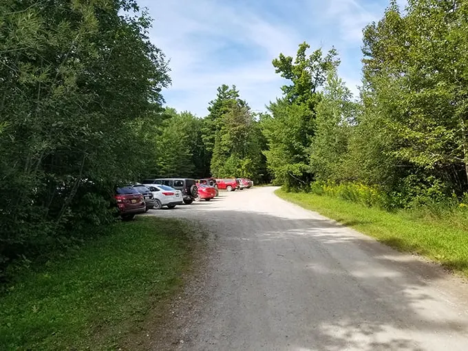 Parking at paradise's doorstep. This unassuming lot is the gateway to adventures that'll make your SUV jealous it can't join in.