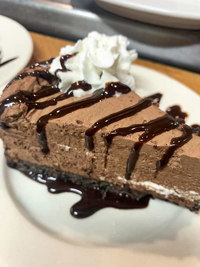 A slice of chocolate heaven that's smoother than Barry White on Valentine's Day. Resistance is futile, my friends.