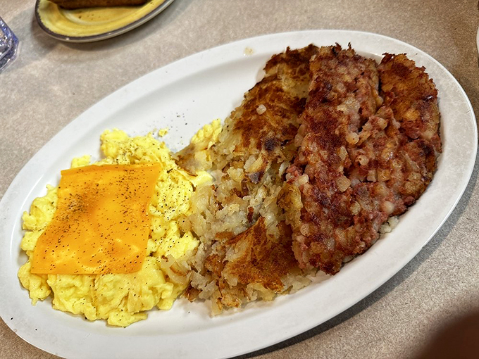 Crispy, golden hash browns: the unsung heroes of any great breakfast plate. They're like edible sunshine on a cloudy Michigan morning!