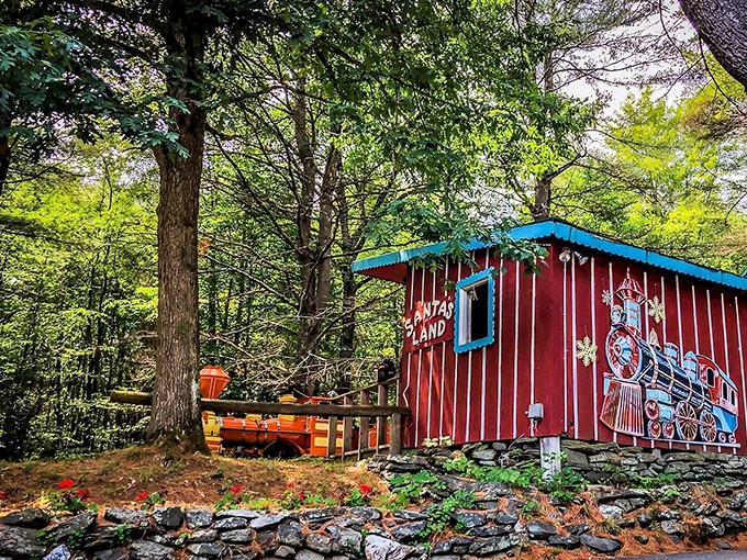 All aboard the Christmas express! This cheery red caboose proves that at Santa's Land, holiday magic is always on track.