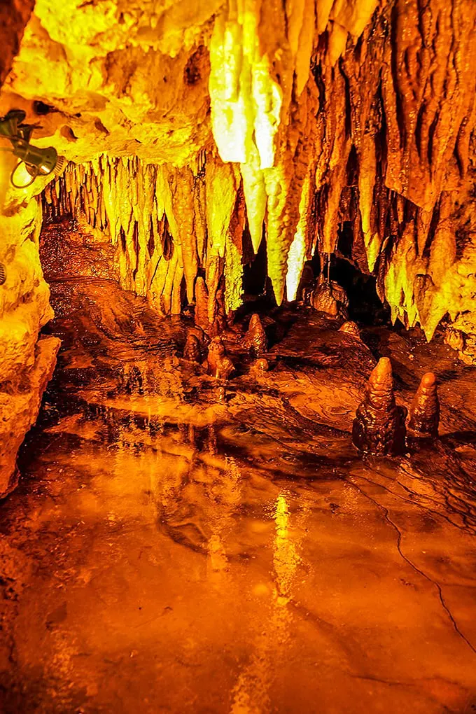 Liquid gold or ancient cave juice? This subterranean pool reflects millions of years of geological artistry. It's like Mother Nature's lava lamp, minus the lava.