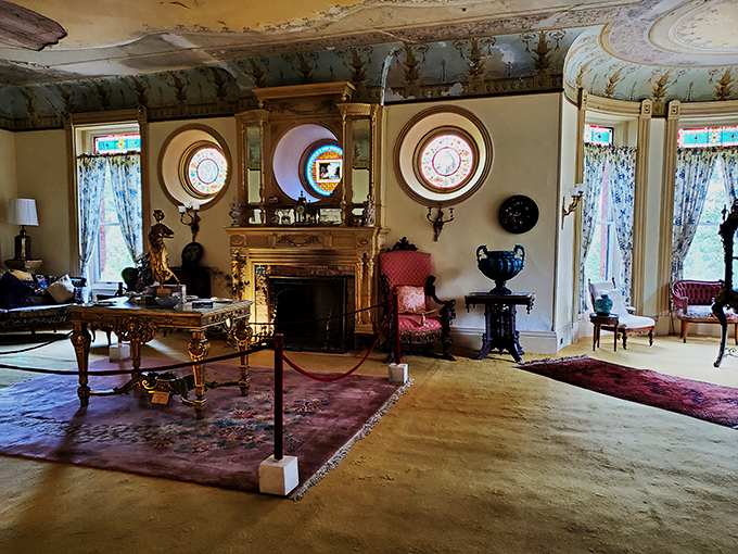 Step into a room that's part "Downton Abbey," part curiosity shop. Those circular windows are like portholes to another era – no seasickness required!
