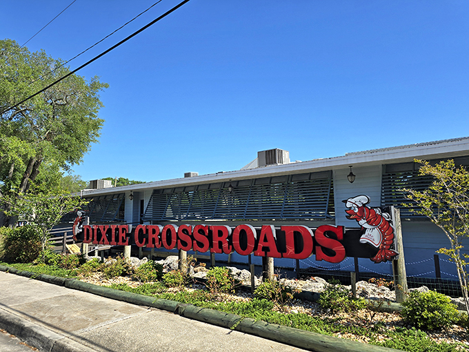 Welcome to seafood paradise! Dixie Crossroads' sign promises a crustacean celebration that'll make your taste buds do the cha-cha.