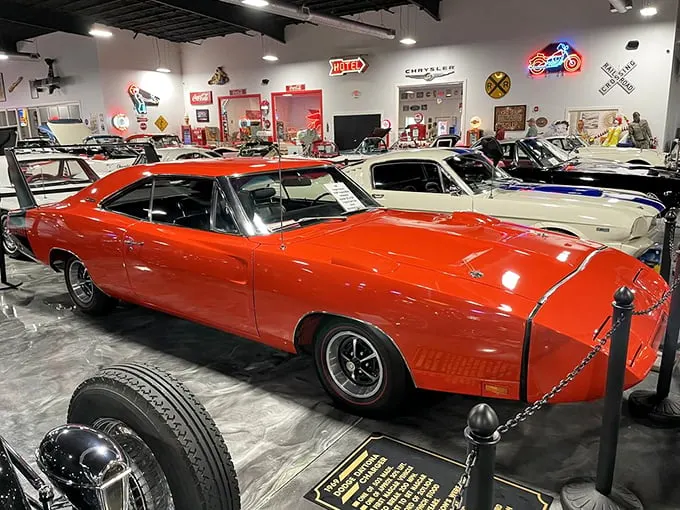 Holy horsepower, Batman! This fire-engine red muscle car looks ready to burn rubber through time itself. Who needs a DeLorean when you've got American muscle?