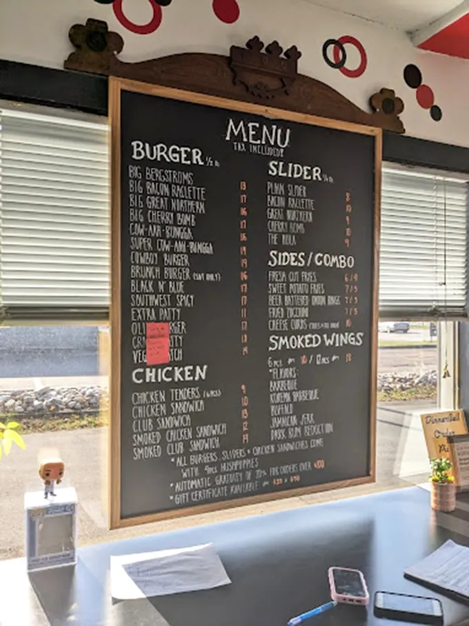 Behold the menu of destiny! Each chalk-scrawled offering is a siren song of comfort food that would make Elvis himself say, "Thank you, thank you very much."