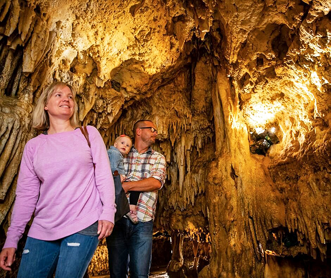 Family spelunking adventure! These intrepid explorers are about to discover that sometimes, the best family bonding happens 70 feet underground. No Wi-Fi needed here!