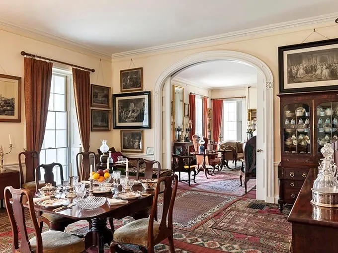 Dinner is served… two centuries ago! This dining room looks ready to host the Founding Fathers for a lively debate over dessert.