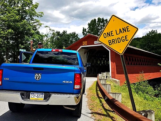 One lane, two directions—it's like a game of chicken for the courteous! Don't worry, there's a system (and it doesn't involve jousting).