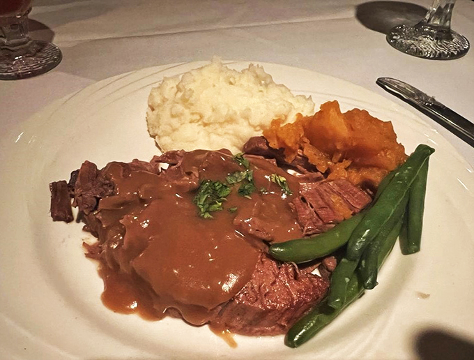 Behold, the pot roast that launched a thousand sighs. This plate could make even your grandmother jealous—don't tell her I said that!