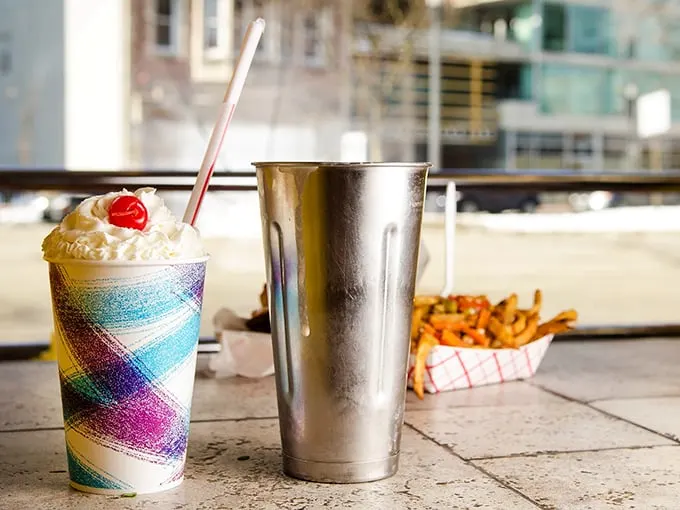 Milkshake magic in a cup! These colorful concoctions are what dreams are made of – if dreams were edible and came with a cherry on top.
