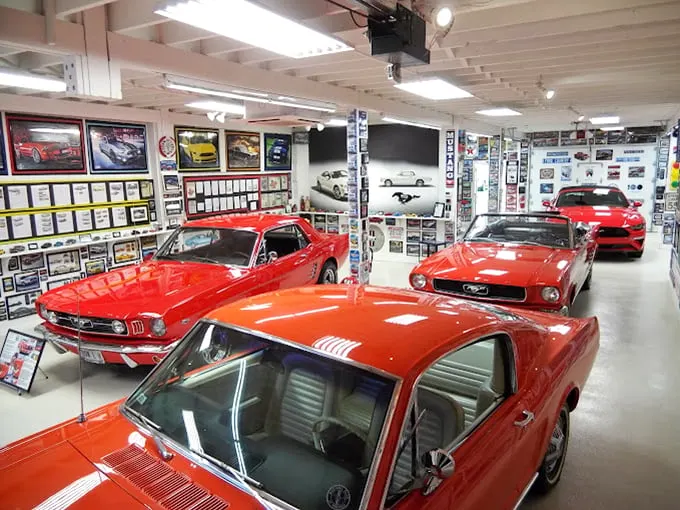 Giddy up, gearheads! This barn is where Mustangs roam free and car enthusiasts come to worship at the altar of Ford.