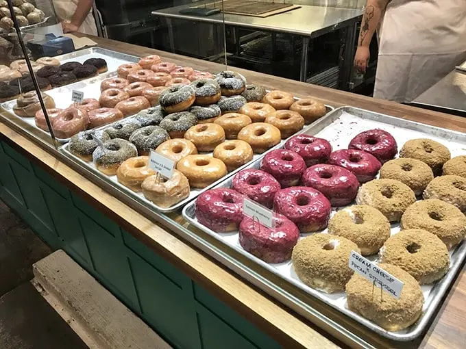 Fifty shades of yum! From classic glazed to wild and wacky, this donut array is a choose-your-own-adventure of flavors waiting to be explored.
