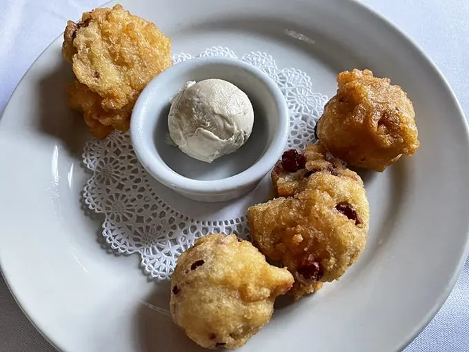 Golden orbs of joy! These cranberry fritters are like edible Christmas ornaments, minus the pine needles and family arguments.