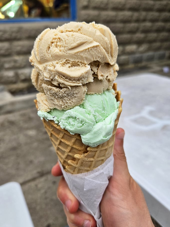 The Leaning Tower of Creamy Goodness! This ice cream cone defies gravity and willpower in equal measure.