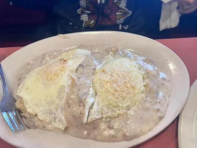Biscuits and gravy with a sunny-side up surprise! It's like breakfast gave you a warm, eggy hug.