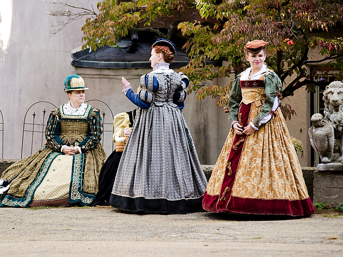 Ladies of the court or time travelers? These elegant dames look ready to waltz right into a Jane Austen novel.