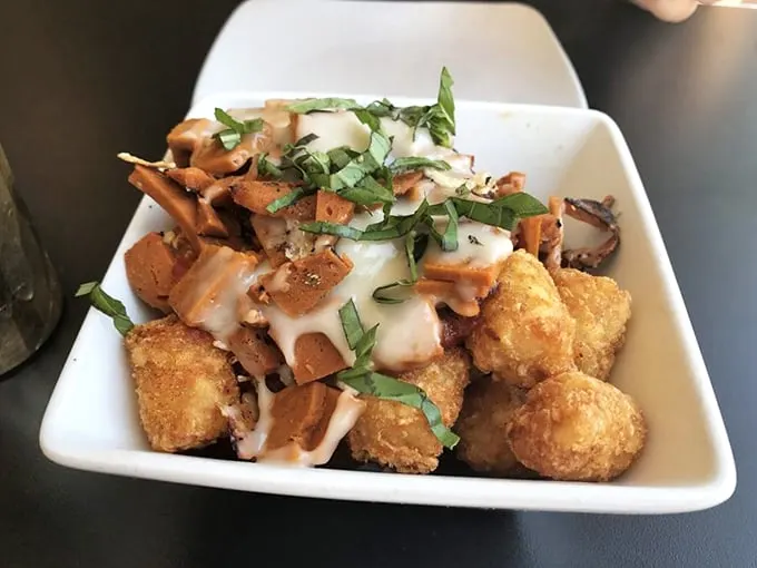 Pizza meets tater tots in this culinary love story. It's like your childhood favorites grew up and got fancy.