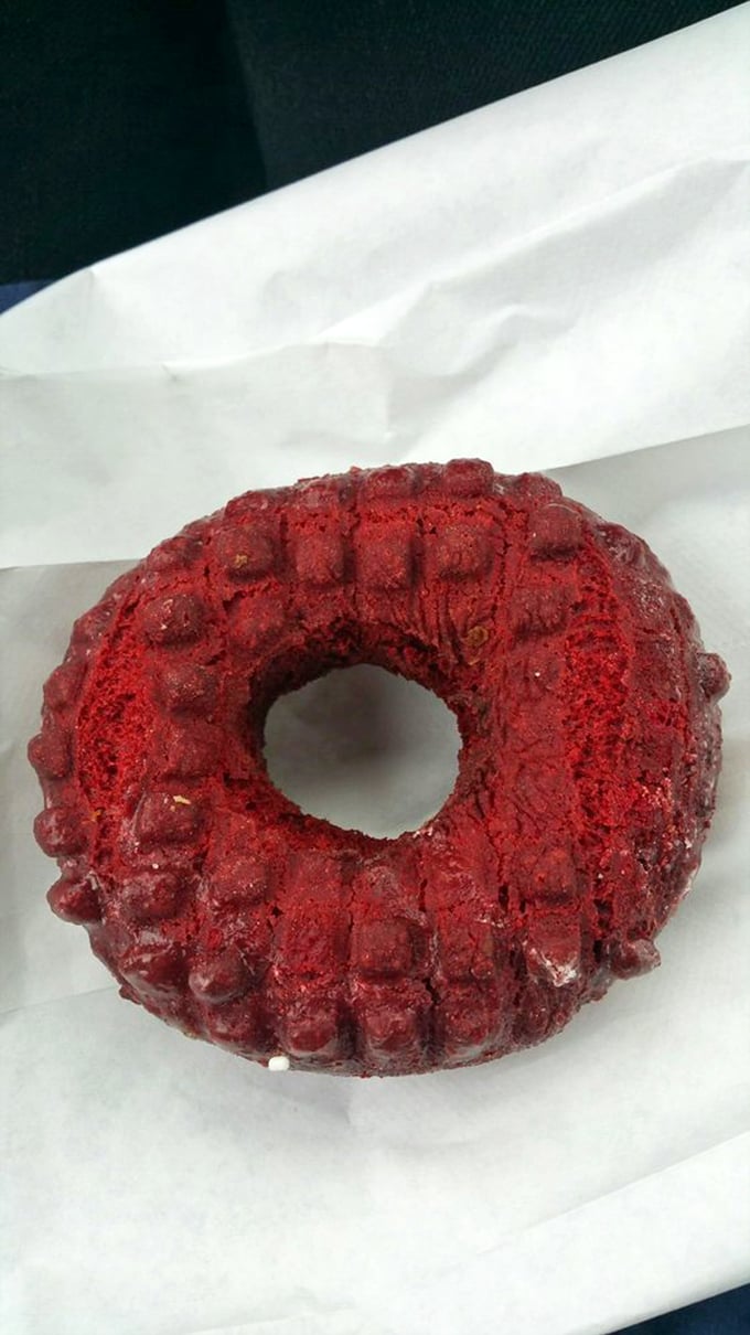 Red velvet royalty! This crimson creation looks like it was plucked straight from the Mad Hatter's tea party, ready to paint your world deliciously red.