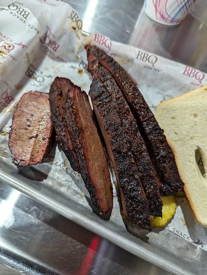 Brisket so tender, it practically melts on the plate. It's the barbecue equivalent of a warm hug from your favorite aunt.