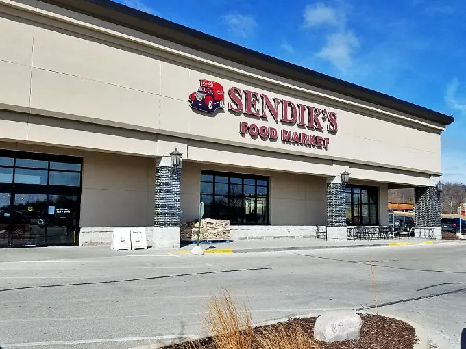 Roadside attraction meets gourmet destination. Sendik's red bags are like souvenirs from food paradise.