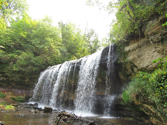 Cascade Falls: Where Main Street meets Mother Nature! It's like finding a gourmet restaurant in a gas station – unexpected and totally delightful.