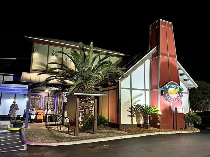 Stinky's at night: Where the seafood is fresh, the atmosphere is electric, and the memories are unforgettable. Dive in!