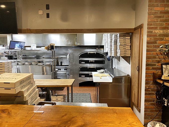 "Where the magic happens." Mimmo's kitchen is a symphony of sizzling pans and aromatic ingredients, conducted by chefs who know their stuff.