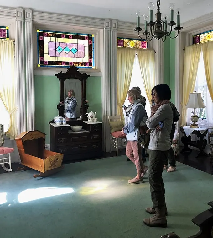"And on your left, you'll see… well, everything!" Tour-goers soak in the Victorian vibes – no Instagram filter needed here.