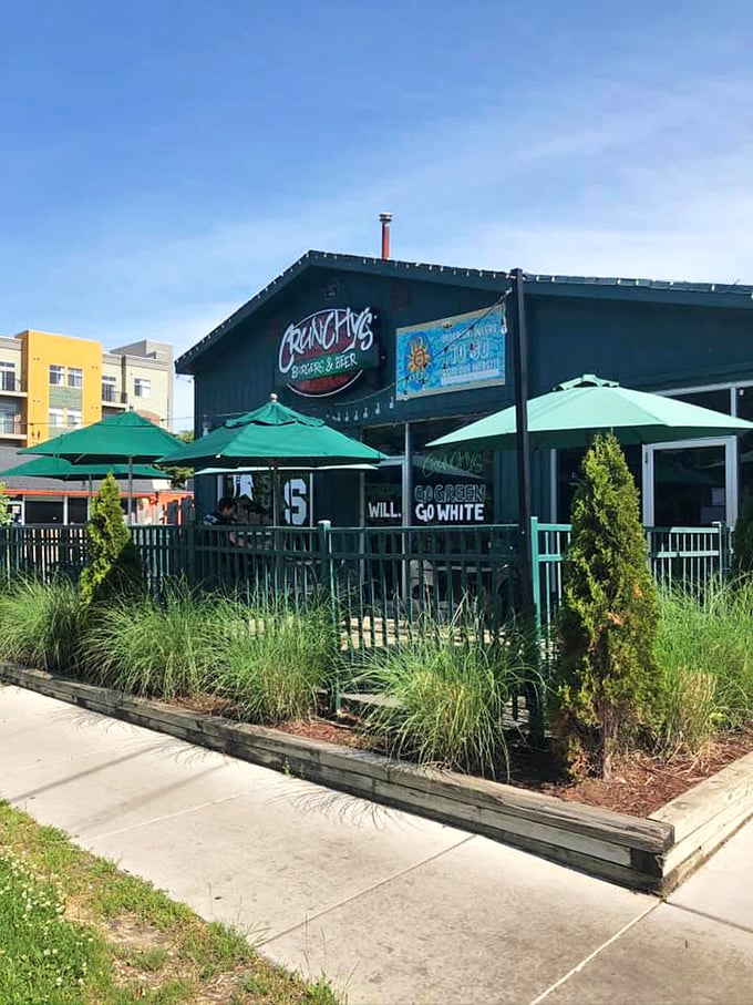 Roadside oasis alert! Crunchy's green facade is a refreshing sight for travel-weary eyes.