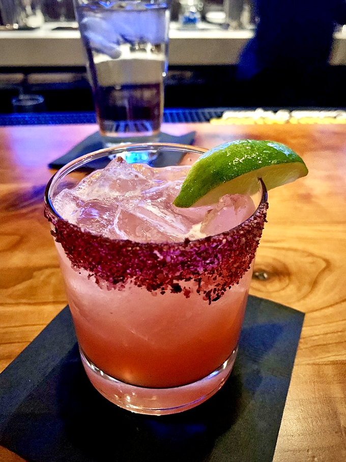 Meet the Sandia Frí­a, a cocktail so pretty it could be in a beauty pageant. Sip with caution – it's a showstopper!