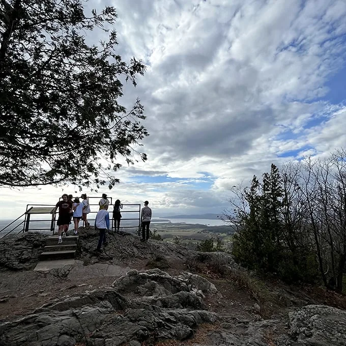 Crowd-sourcing the perfect sunset spot. These folks have found the best seat in the house for nature's nightly show.