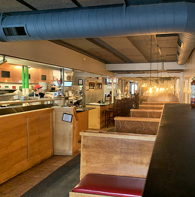 "Cozy corners and pizza perfection." Mimmo's dining area invites you to settle in, whether for a romantic date or a festive family gathering.