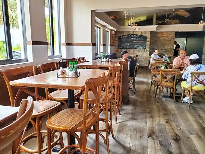 The dining area: where comfort meets style. It's like your cool Italian cousin's living room, but with better food and no plastic-covered sofas.