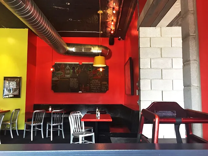 Red hot and ready to roll! The Fly Trap's interior is a bold mix of colors and textures that'll kickstart your day.