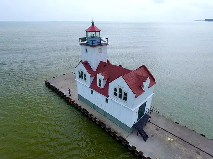 Red-hot and ready to shine! This vibrant lighthouse brings a pop of color to Kewaunee's shoreline.