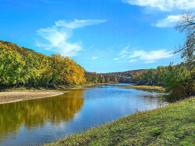 "Who needs a therapist when you've got this view?" A serene river scene invites contemplation and maybe a picnic or two.
