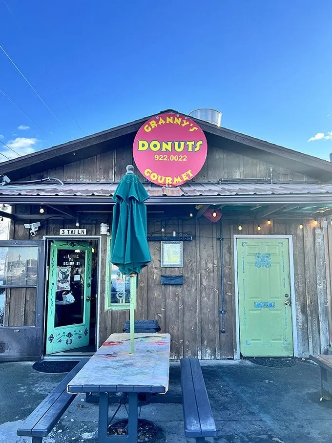 Welcome to donut paradise! Granny's rustic cabin exterior promises sweet treasures within, like a Hansel and Gretel house for grown-ups.