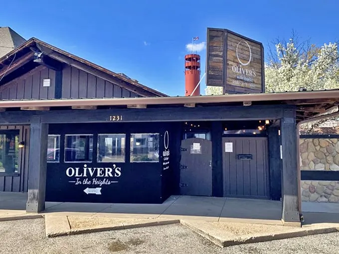 Welcome to pizza paradise! Oliver's sleek exterior is like a little black dress for buildings – classy, timeless, and always inviting.