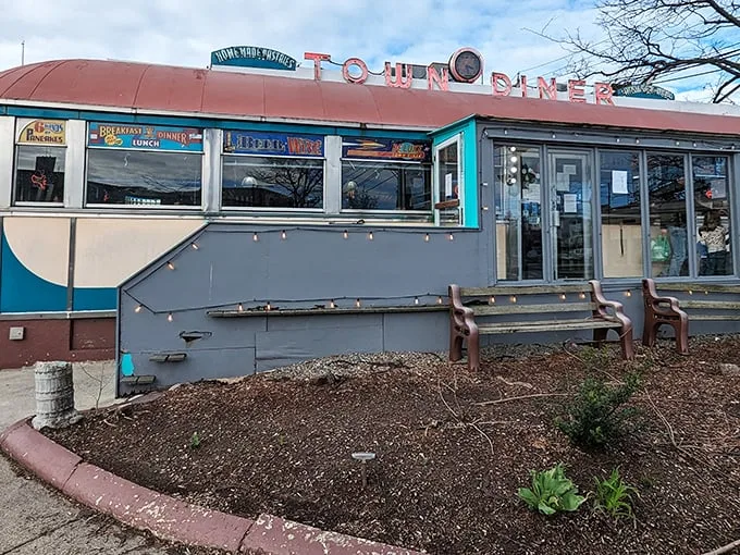 A neon-lit time machine! This classic diner exterior promises a journey back to when breakfast was king and calories were just a twinkle in your doctor's eye.