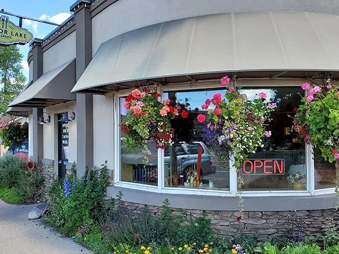 A floral welcome that's prettier than your grandma's Sunday best! Mirror Lake Diner's exterior blooms with charm, promising a feast for both eyes and stomach.