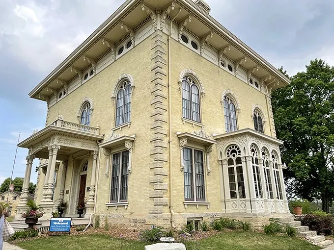 A lemon-hued time machine! This Italianate mansion isn't just eye candy—it's a portal to the 1850s, complete with Lincoln's ghost (maybe).