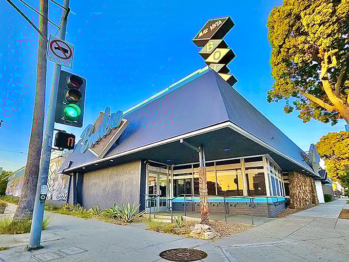 Groovy, baby! This retro-chic exterior is like a time machine to the swinging '60s, complete with a sign that screams "Let's Bowl!"