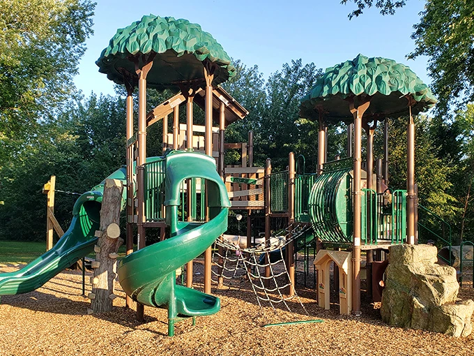 Welcome to the Emerald City! This playground isn't just for kids – it's where adults rediscover their inner child and perfect their "whoosh" on the slides.