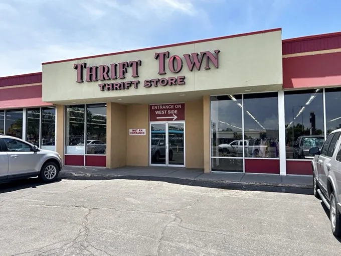 Welcome to Thrift Town, where bargain hunters' dreams come true! This unassuming exterior hides a treasure trove of secondhand delights waiting to be discovered.