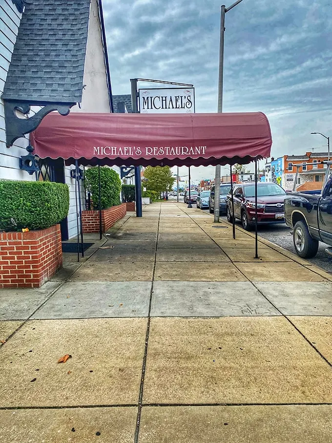 Welcome to flavor town! Michael's iconic red awning beckons like a culinary lighthouse, guiding hungry souls to gastronomic bliss.