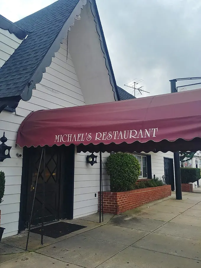 Welcome to flavor town! Michael's iconic red awning beckons like a culinary lighthouse, guiding hungry souls to gastronomic bliss.