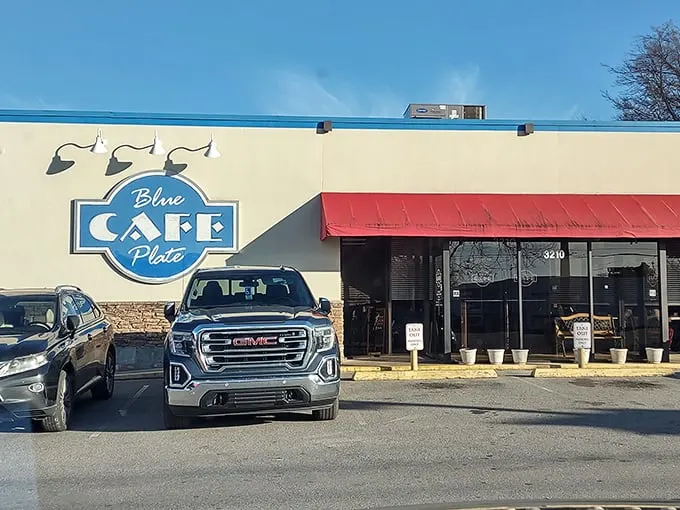 A blue-trimmed beacon of breakfast bliss! This unassuming exterior hides a treasure trove of Southern comfort food that'll make your taste buds dance.
