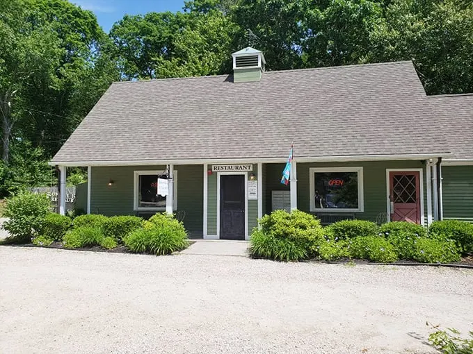 A cozy green haven beckons! The Hungry Haven's exterior is like a warm hug from your favorite aunt, complete with charming flower beds and a welcoming atmosphere.