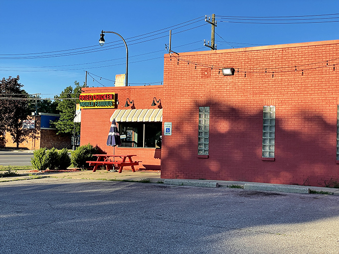 A red-brick beacon of flavor! Gus's exterior promises a no-frills experience that's all about the chicken. It's like the Fort Knox of fried poultry – plain outside, but pure gold within.