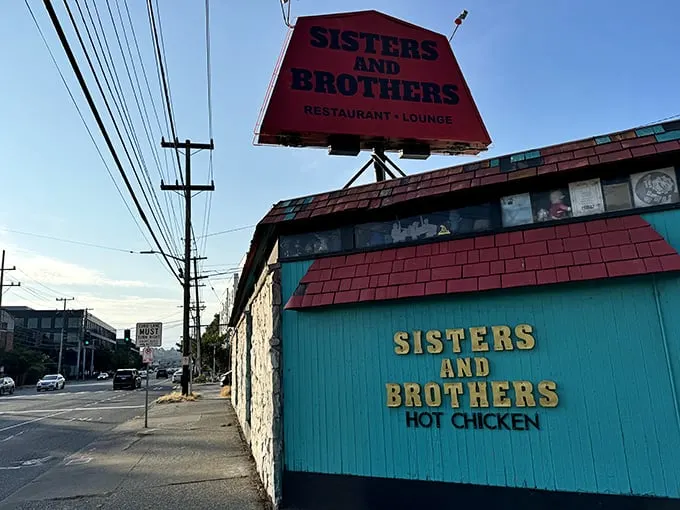 Teal meets brick in this culinary hideaway. Sisters and Brothers stands out like a peacock at a pigeon convention, promising Nashville heat in the heart of Seattle.